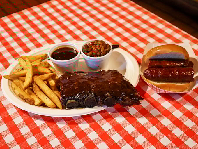The BBQ trifecta: ribs, fries, and slaw. It's like the Three Musketeers of comfort food, ready to defend your right to deliciousness.