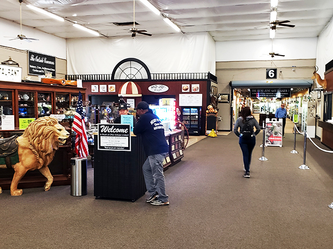 Step right up, folks! This entrance is like the wardrobe to Narnia, but instead of snow, you'll find vintage goodies.