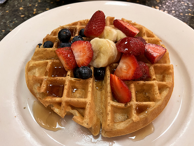 Behold, the waffle of your dreams! Crispy, golden, and adorned with nature's candy. It's fruit, so it's practically a salad, right?