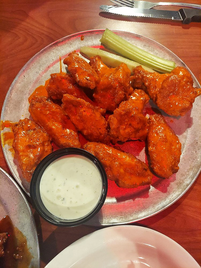 Classic buffalo wings, nature's perfect food. Crispy, saucy, and begging to be devoured – resistance is futile!