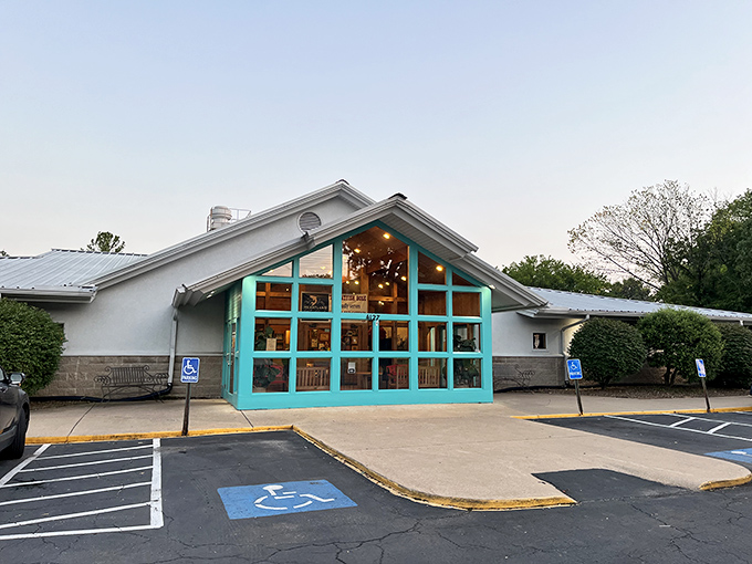 Catfish Hole: where comfort food gets a aquatic makeover. That turquoise trim is like a beacon for hungry souls!