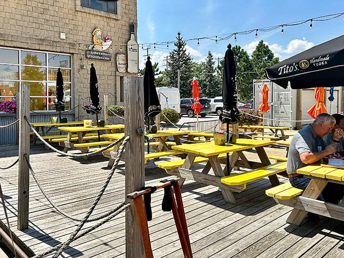Colorful umbrellas, picnic tables, and string lights – it's as if a Pinterest board came to life and decided to serve amazing seafood.