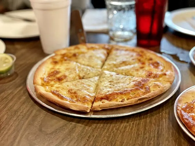 Cheese pizza perfection: where simplicity meets indulgence. It's the little black dress of the pizza world – timeless and always appropriate.