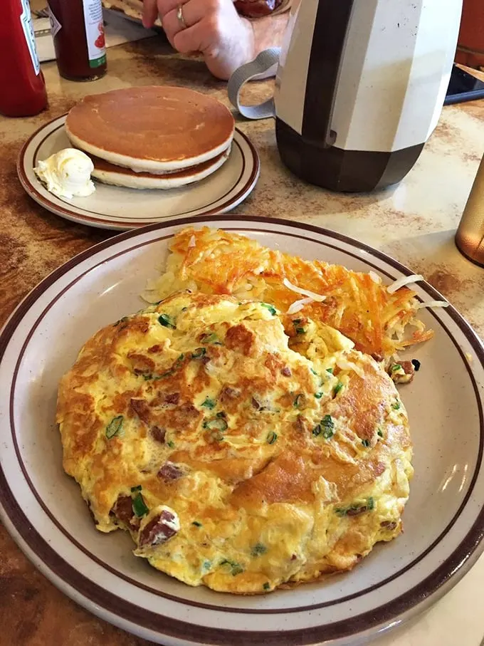Portuguese sausage omelet: where Old World meets New in a harmonious blend of flavors. It's like a culinary luau in your mouth!