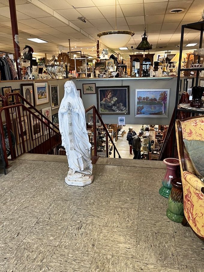 Going up? This celestial stairway, guarded by a serene statue, leads to floors of fascination. Mind the gap between centuries!