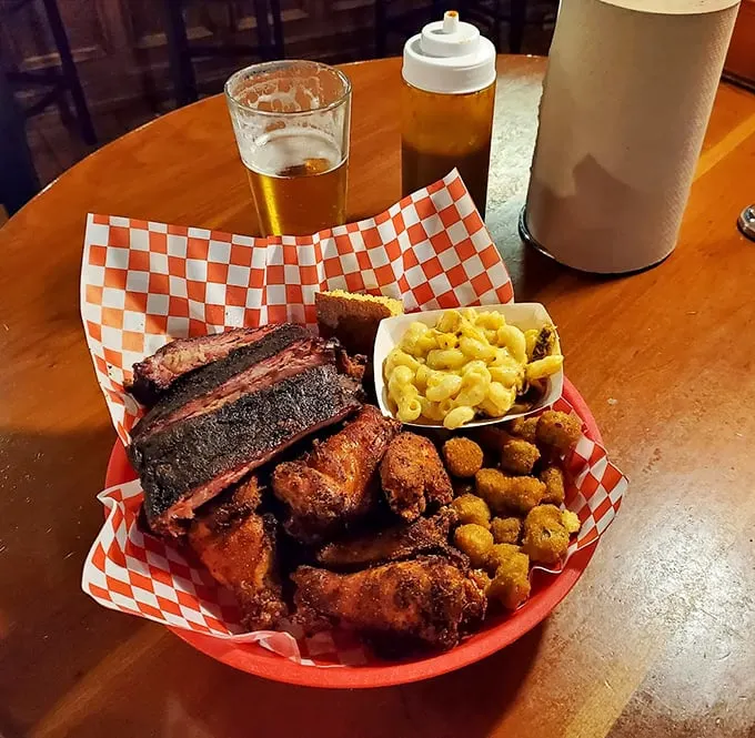 "The holy trinity of BBQ!" Ribs, chicken, and mac 'n' cheese join forces in this platter that's more satisfying than finding the last parking spot at a Costco on a Saturday.