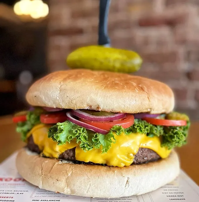 This isn't just a cheeseburger; it's a work of art. With melty cheese cascading over a perfectly grilled patty, it's the Mona Lisa of the burger world.