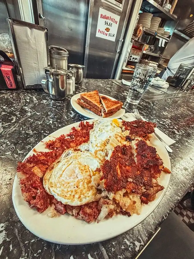 Corned beef hash with eggs sunny-side up – the breakfast equivalent of finding a parking spot right in front of your destination in Manhattan.