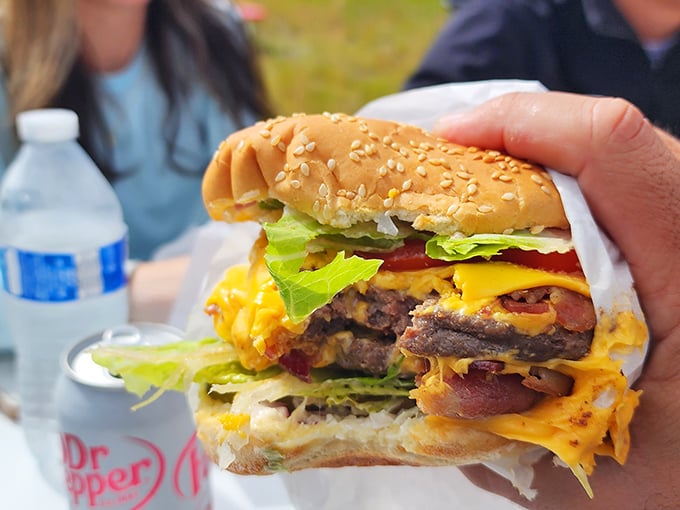 Double trouble or double delight? This towering cheeseburger is the Everest of lunch – a conquest worth bragging about.