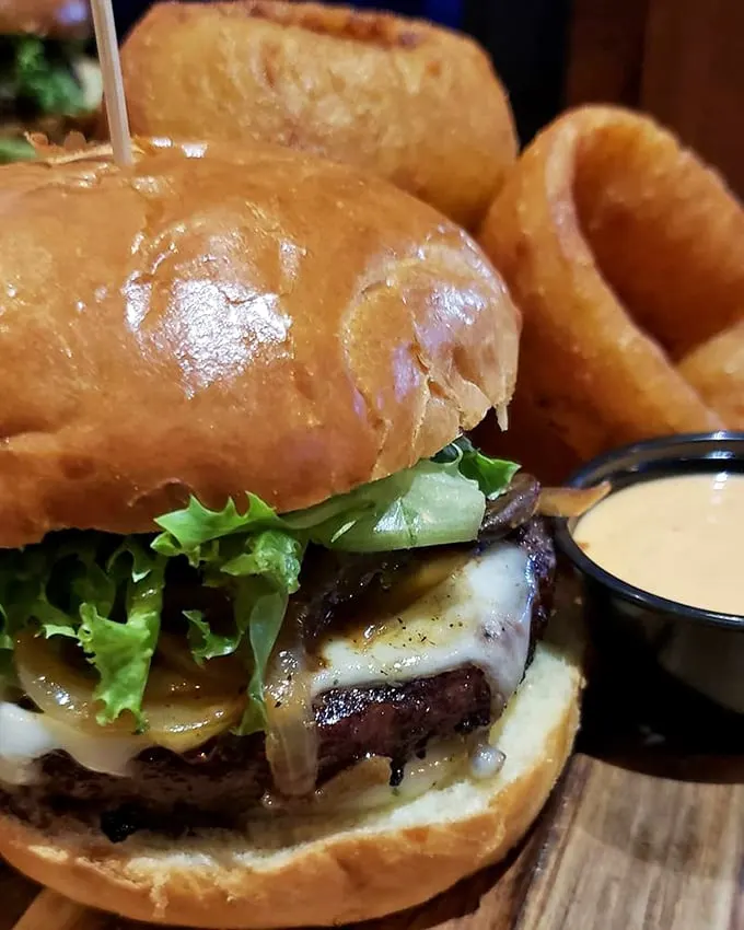 Kobe or not Kobe, that is the question! This burger's siren song of melty cheese and golden bun is impossible to resist.