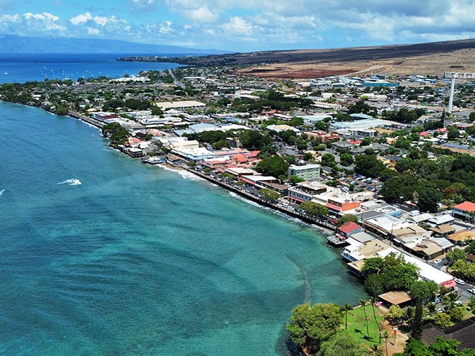 Bird's eye bliss! Lahaina's coastline is a perfect blend of azure waters and charming architecture – Mother Nature's own masterpiece.