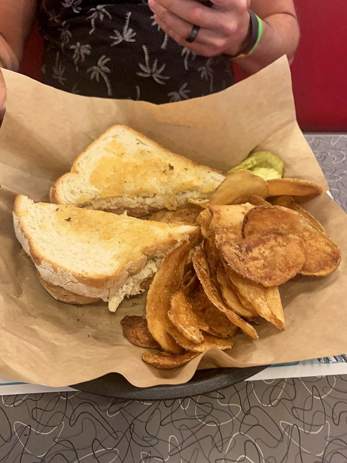 The humble tuna melt, elevated to art form. Those homemade chips? Crunchier than your dad's favorite vinyl records.