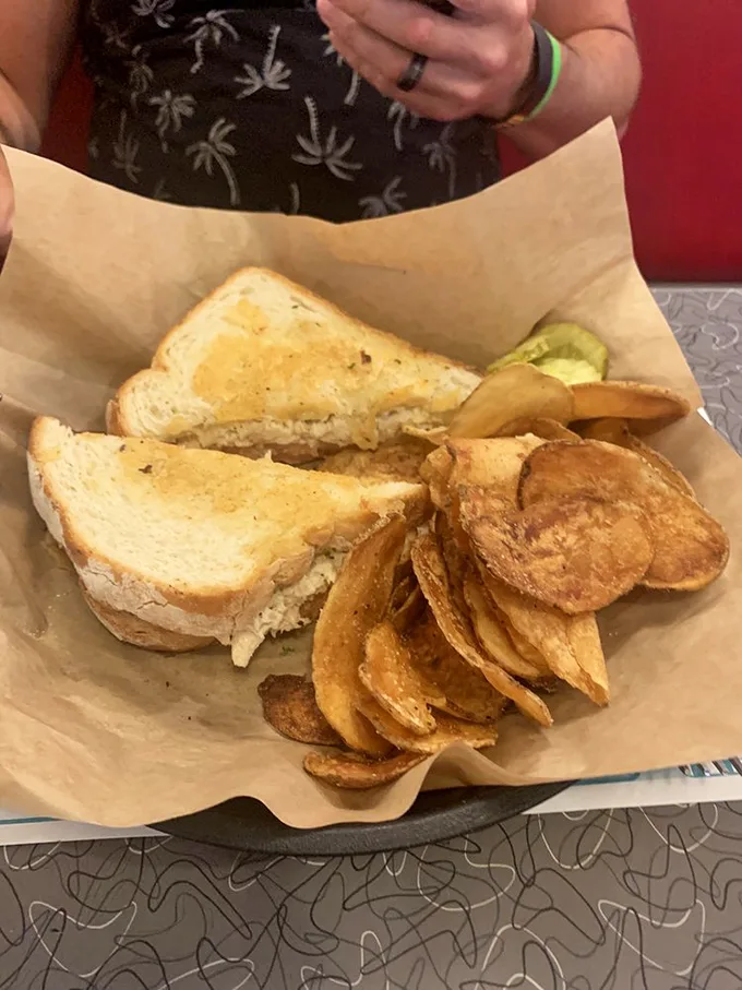The humble tuna melt, elevated to art form. Those homemade chips? Crunchier than your dad's favorite vinyl records.
