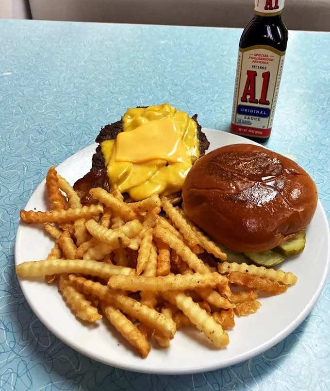 A cheeseburger that doesn't need fancy aioli or artisanal buns to prove its worth—just A1 sauce and the confidence that comes from decades of perfection.