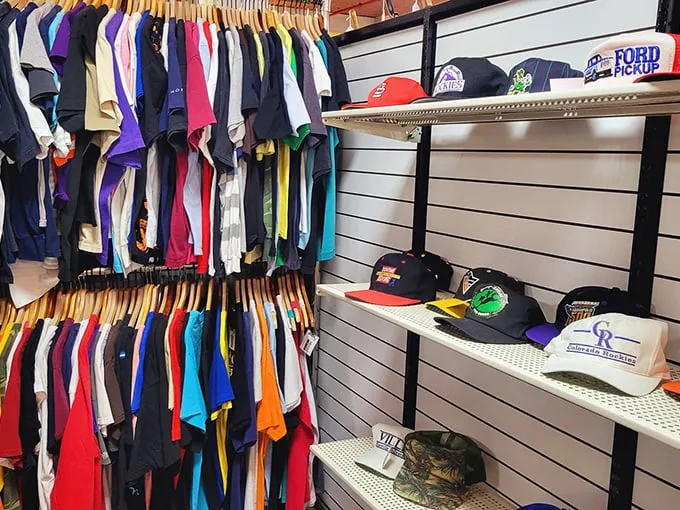 Vintage tees and baseball caps tell stories of places visited, teams supported, and fashion trends survived—some more successfully than others.