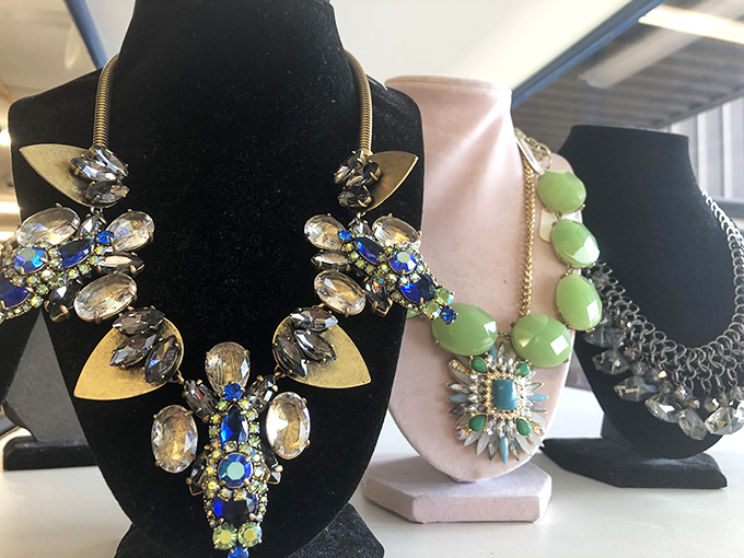 Costume jewelry that transforms ordinary outfits into red-carpet moments. That statement necklace costs less than your morning latte.