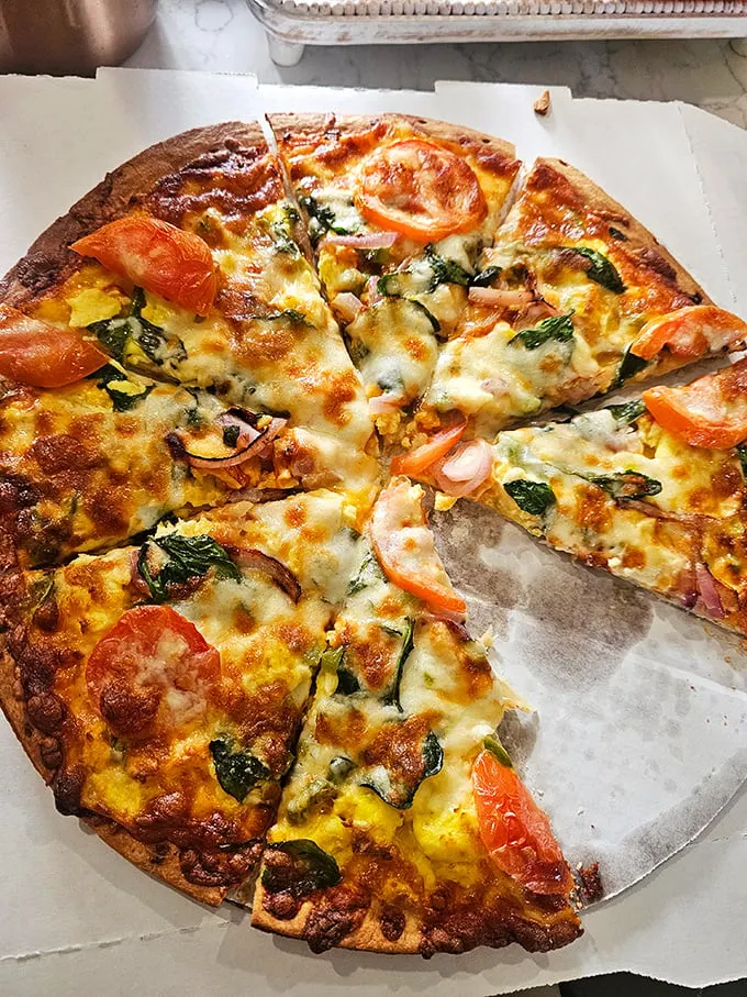 Pizza by day, donuts by night? Cranky Al's is the superhero of comfort food! This pie looks so good, it might just make you forget about donuts... almost.