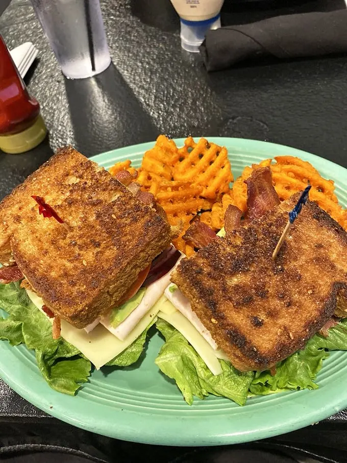 Sandwich goals achieved! This golden-brown beauty is stacked higher than my unread book pile. Time to dive in, folks!