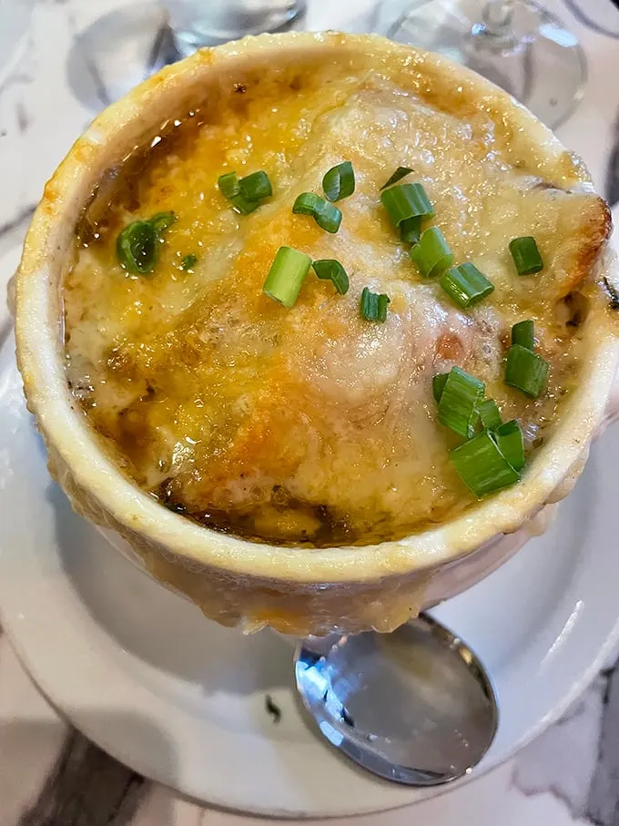 French onion soup so good, it's bringing tears to my eyes. And no, it's not just the onions – it's pure joy in a bowl.