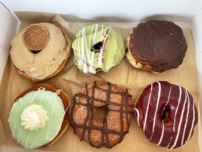 Metal trays elevate the humble donut to art gallery status. That chocolate-drizzled masterpiece deserves its own velvet rope.