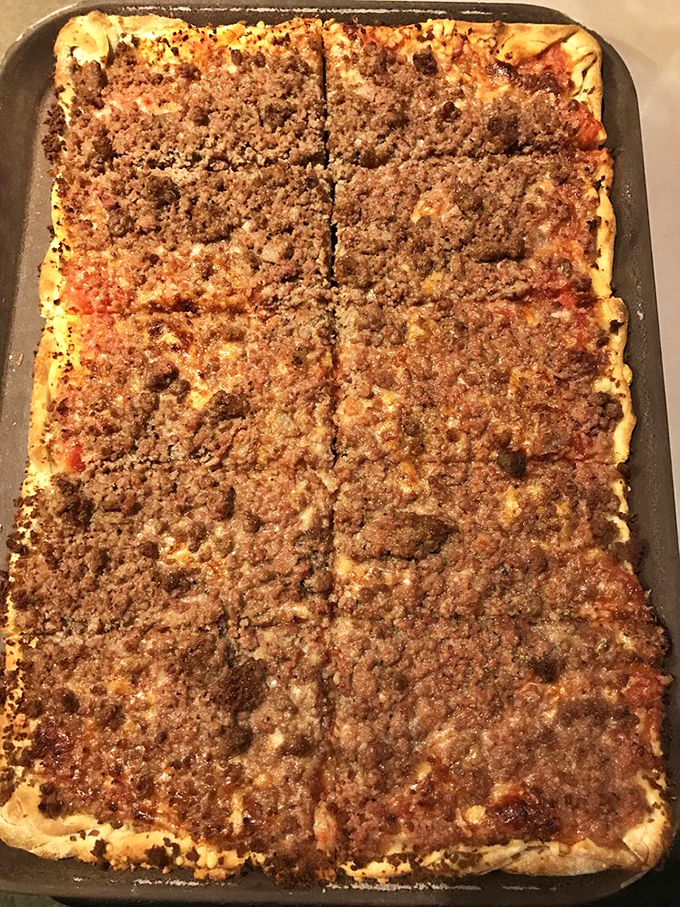 The "meat carpet" has arrived! It's like someone took all your favorite deli meats and turned them into the world's most savory jigsaw puzzle.