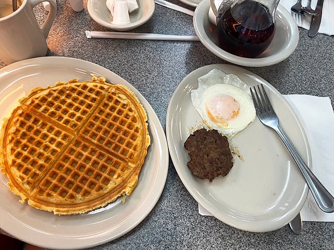 The breakfast of champions! This classic combo of waffle, eggs, and coffee is like a morning pep talk on a plate.