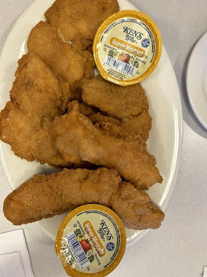 Chicken tenders that could make Colonel Sanders weep with joy. Crispy, golden, and begging to be dunked in that honey mustard – resistance is futile!