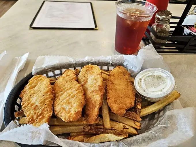 Chicken tenders that actually taste like chicken, served with fries that didn't spend their entire existence in a freezer waiting to meet you.