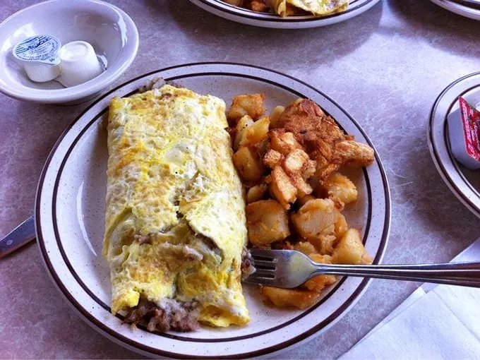 Breakfast of champions! This corned beef hash omelette is like a warm hug for your taste buds. Pass the ketchup, please!