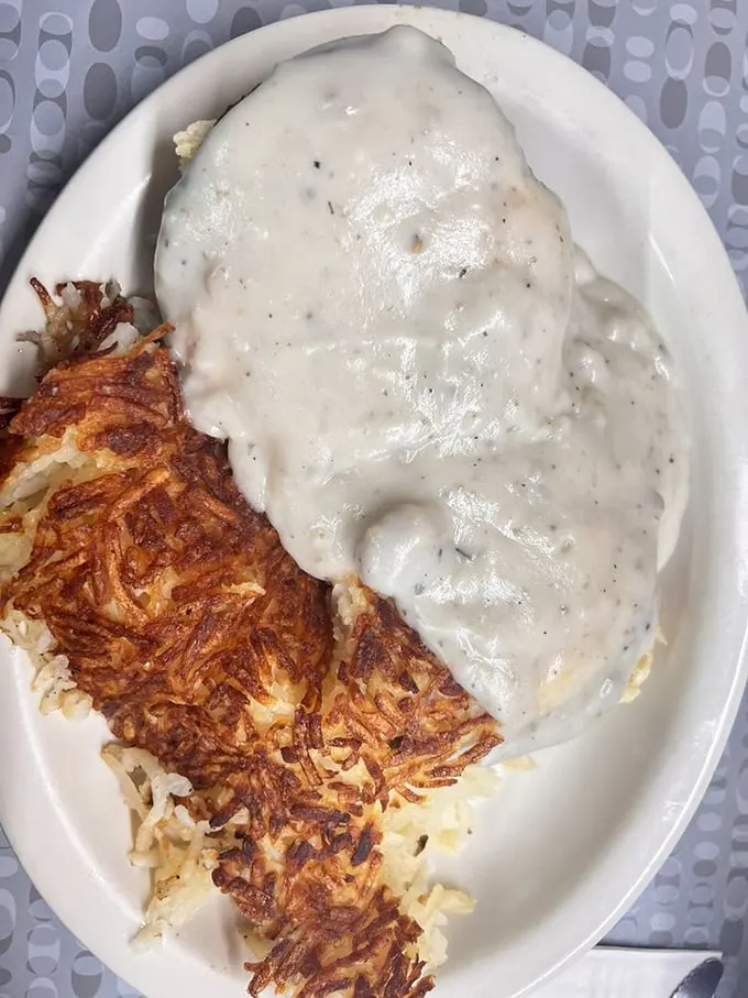 Country Benedict: Where biscuits go to fulfill their gravy-covered dreams. It's comfort food nirvana, Alaska-style!