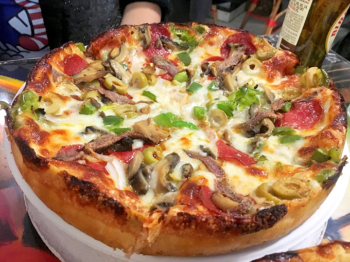 The "Everything" pizza: For when you can't decide and don't want to! It's like the Swiss Army knife of pizzas – versatile, loaded, and ready for anything.