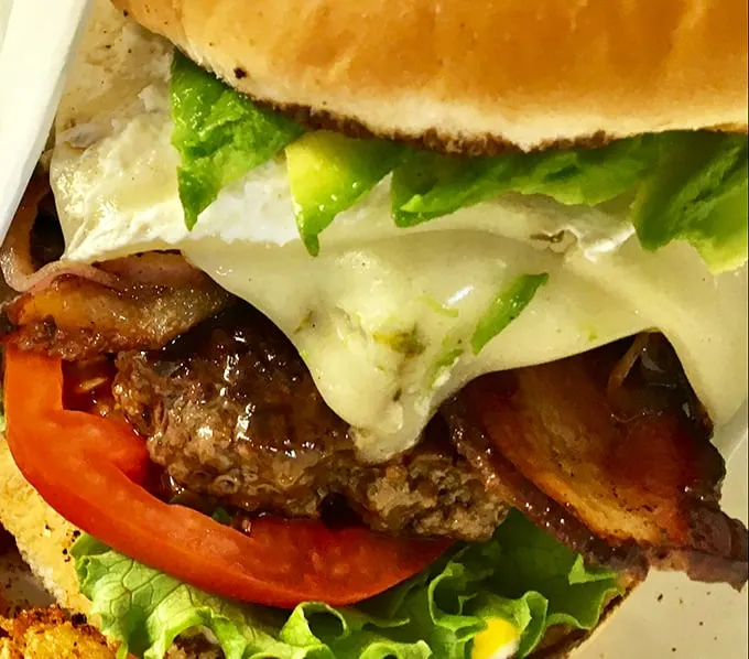 Size does matter! This behemoth burger is so big, it needs its own zip code.