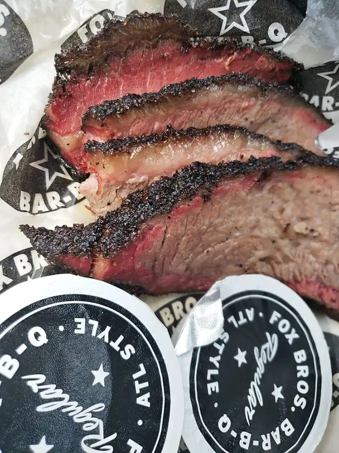 Brisket so perfectly pink it makes other meats jealous. That smoke ring isn't just for show—it's a flavor halo.