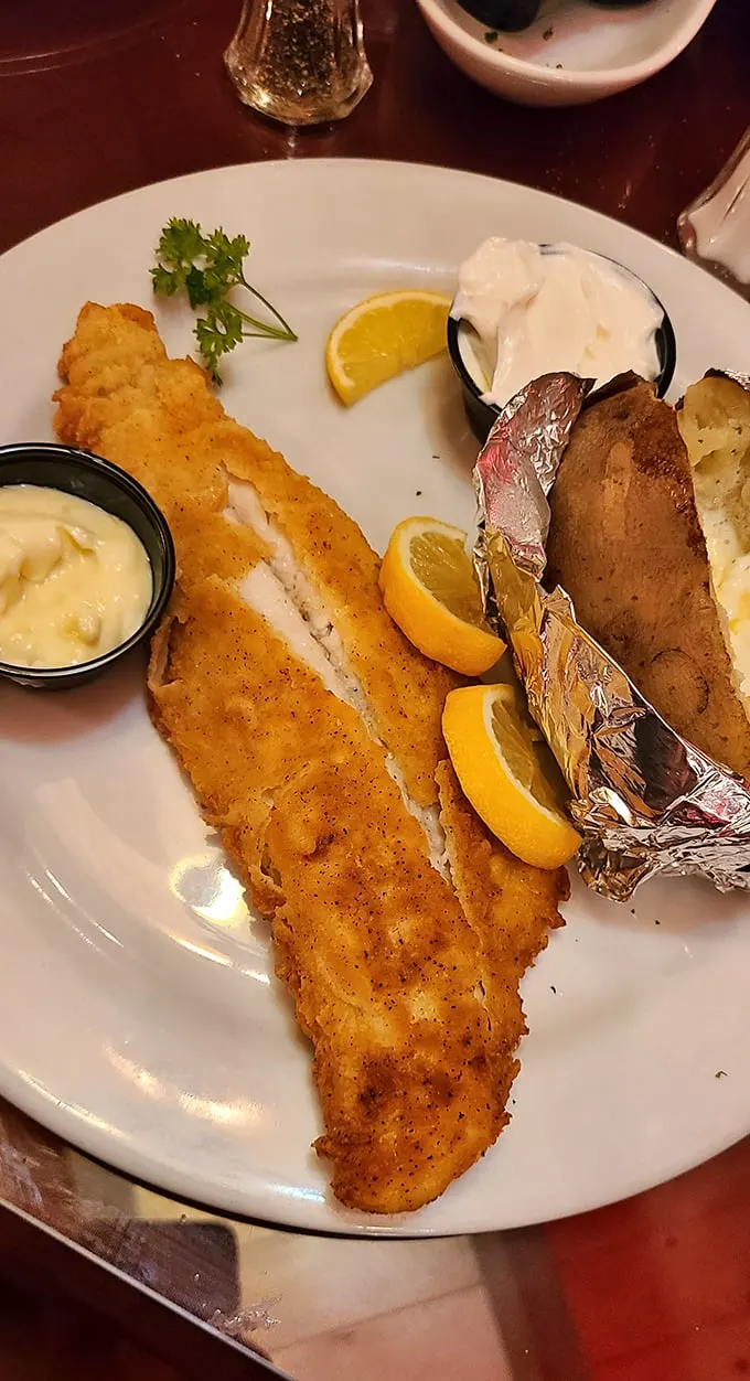 Golden-fried walleye that's crispier than your grandpa's jokes. Paired with a baked potato that's dressed to impress!