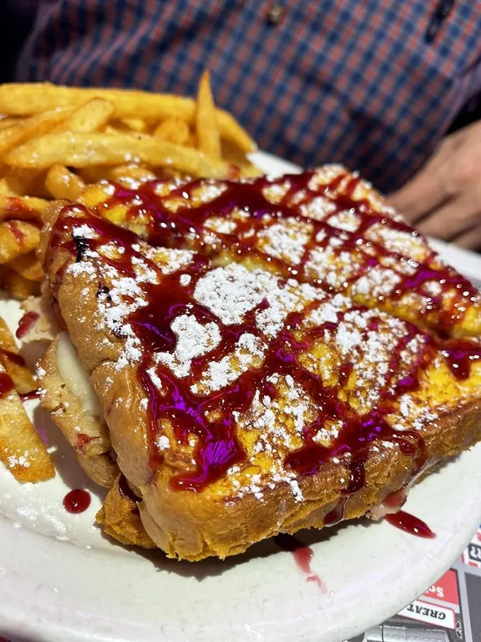 The Monte Carlo: where French toast meets ham and cheese in a powdered sugar snowstorm. It's breakfast's way of saying, "You're welcome."