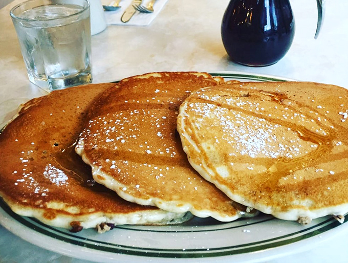 Pancake perfection! These golden discs of joy are so fluffy, they might float away if not weighed down by syrup and butter.