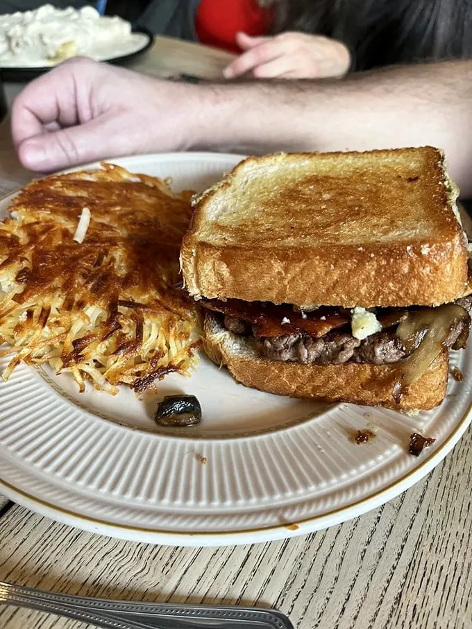 The sandwich that launched a thousand ships—or at least a few hundred satisfied customers. Paired with those golden hash browns, it's a dynamic duo.