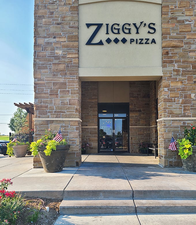 American flags flank Ziggy's entrance—patriotism pairs perfectly with pizza, after all.