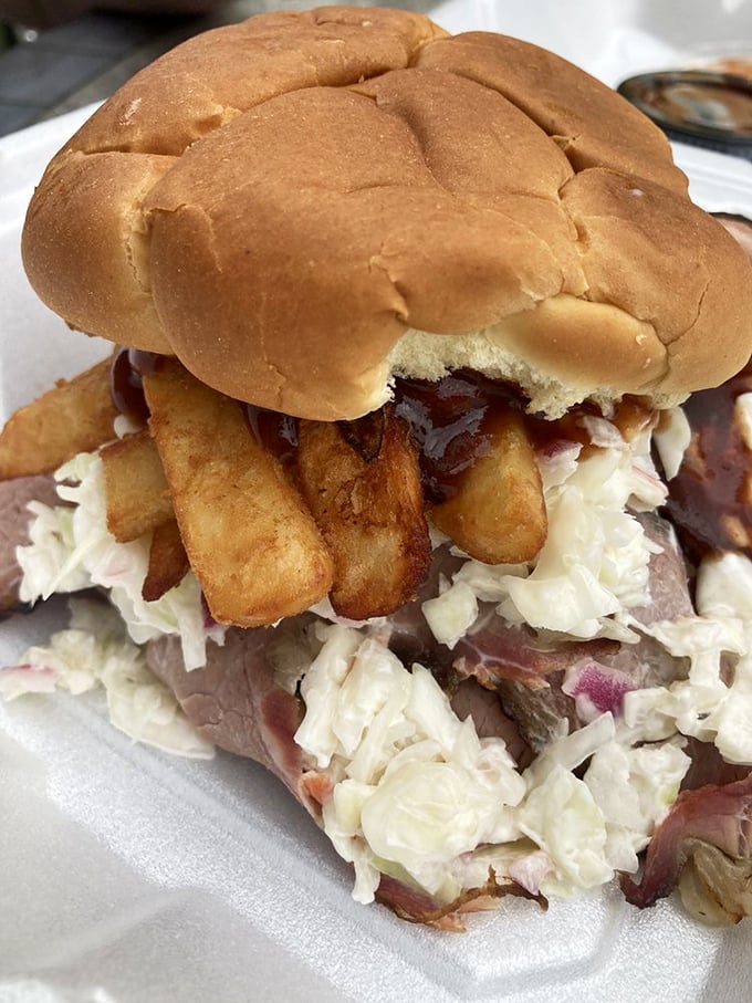 A sandwich that Pittsburgh would approve of—stacked higher than a steel girder and twice as sturdy. Those fries aren't hiding; they're making a statement.