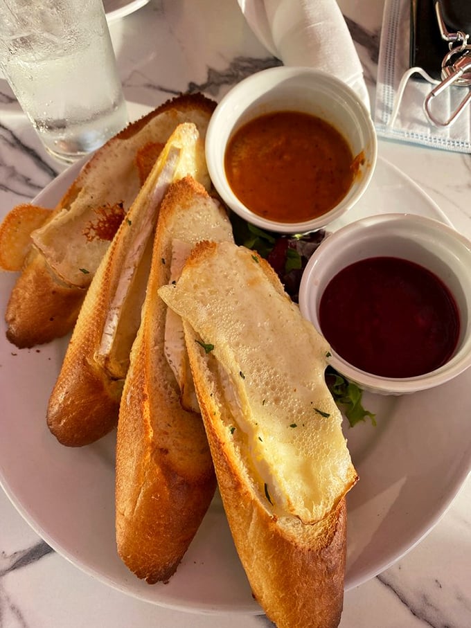 Baked Brie alert! This gooey masterpiece is about to make your cheese dreams come true. Bonus: it counts as forearm exercise.