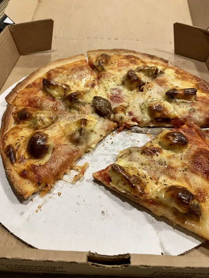 Hepburn's Delight: A pizza with more personality than Katharine herself. Jalapeños and chicken creating a spicy Hollywood romance.