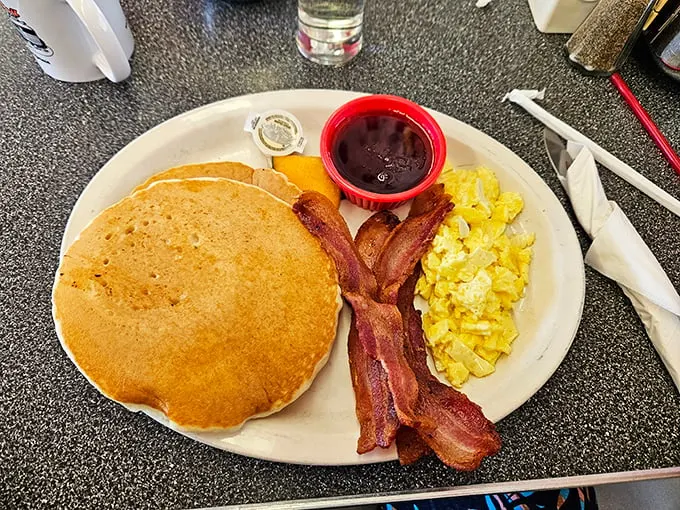 Pancakes so golden, they belong in Fort Knox! Paired with crispy bacon and eggs, it's the breakfast of champions (and everyone else).
