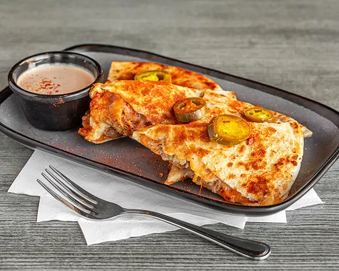 Quesadillas gone rogue! Corky's BBQ twist on this Mexican classic is a cheesy, meaty masterpiece that'll make you say "¡Olé!