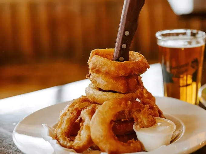 Onion rings and craft beer: A match made in comfort food heaven. It's like a hug for your taste buds!