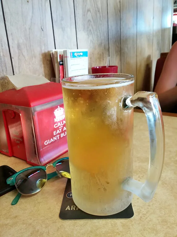 Cheers to good taste! Nothing washes down a burger quite like a frosty mug of liquid gold.