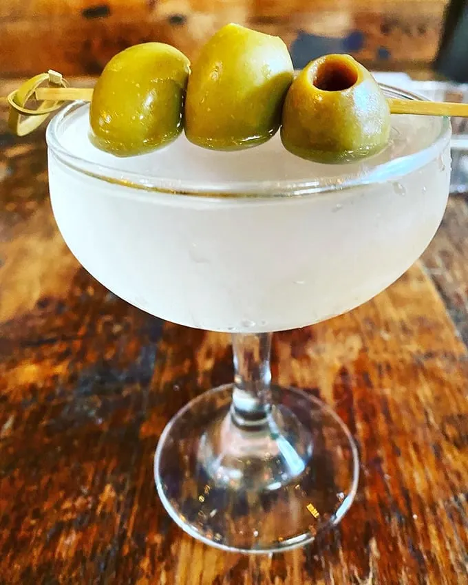 Olive you need is love... and this martini! A classic cocktail gets a savory twist, proving that barbecue and booze are a match made in heaven.