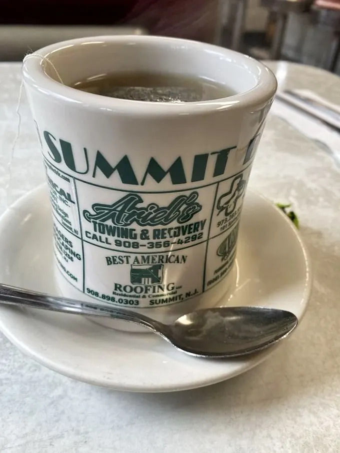The humble coffee mug – advertising local businesses while delivering liquid motivation that's kept Summit residents going since the Great Depression.