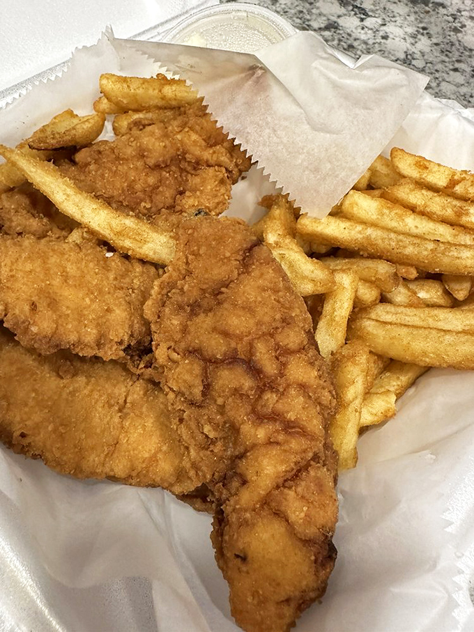 Chicken tenders and fries: The dynamic duo of comfort food. It's like a warm hug for your stomach.