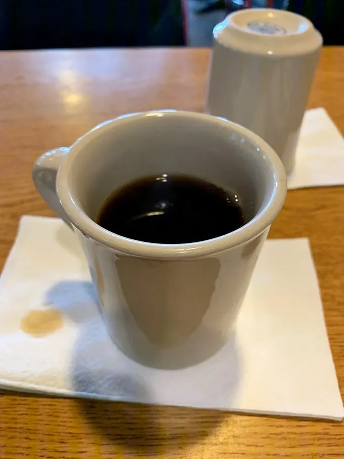 The elixir of life, diner-style. This cup of joe isn't just coffee; it's a warm hug for your insides on a chilly Washington morning.