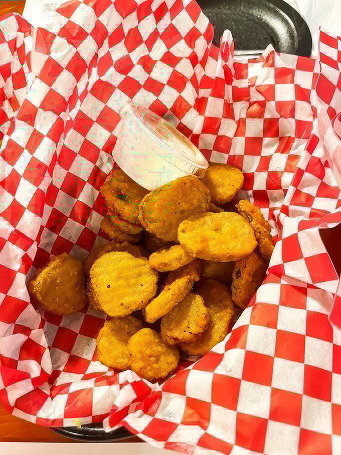 Crispy, tangy, addictive! These fried pickle chips are the perfect sidekick to your BBQ adventure – Cape and tights optional.